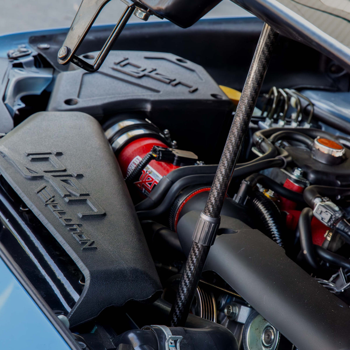 Carbon Fiber Hood Prop – Burton-Racing